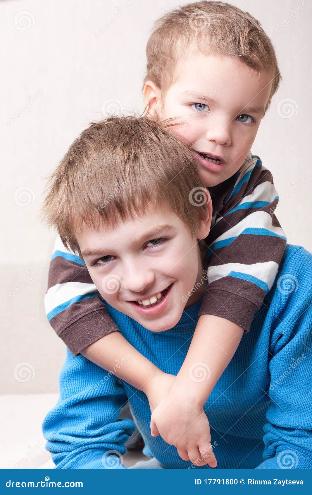 Portrait of two brothers stock photo. Image of look, sofa - 17791800