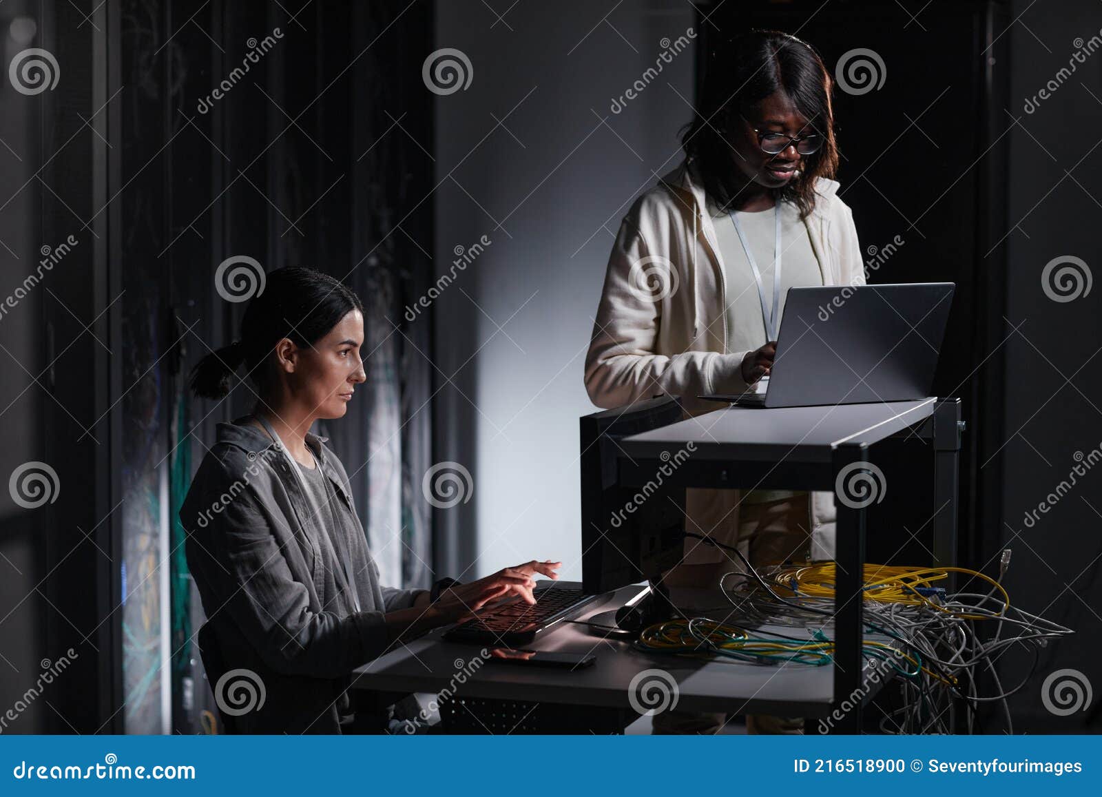 Two Female it Engineers in Server Room Stock Photo - Image of ...