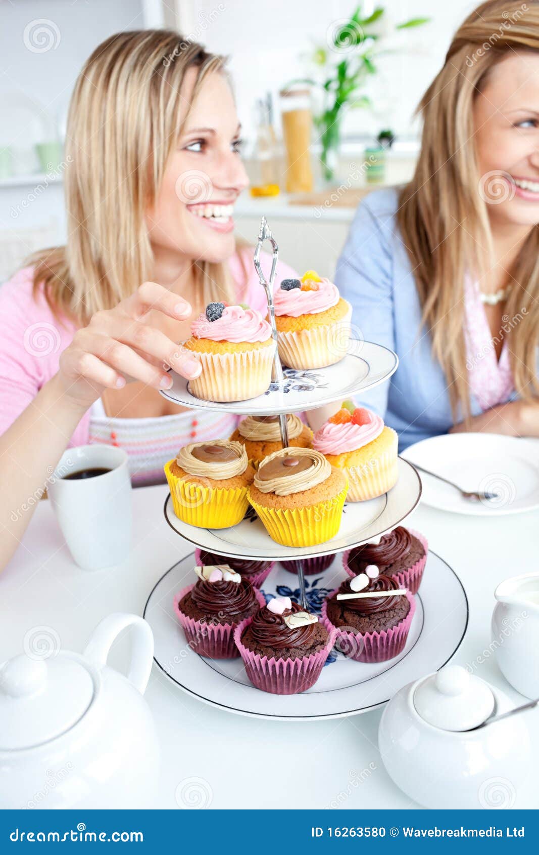 Portrait of Two Friends Eating Pastries in the Ki Stock Photo - Image ...