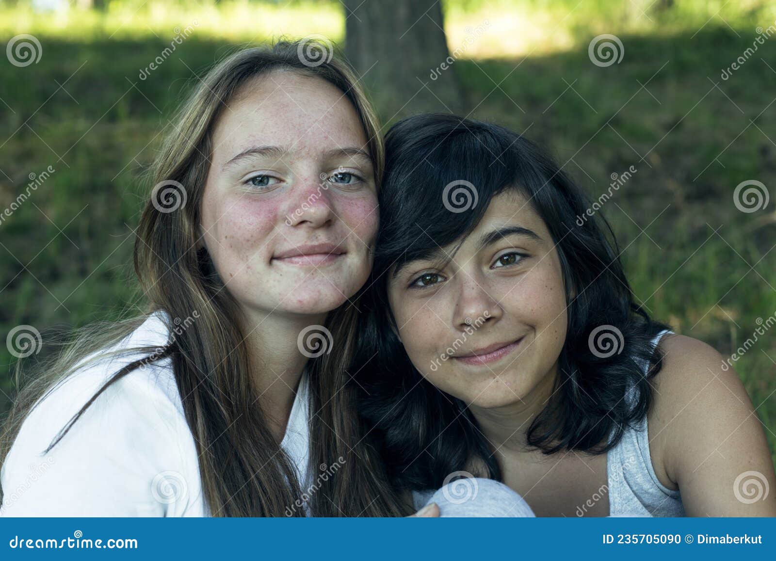 Portrait of Two Girls in a Park in Summer. Stock Photo - Image of ...