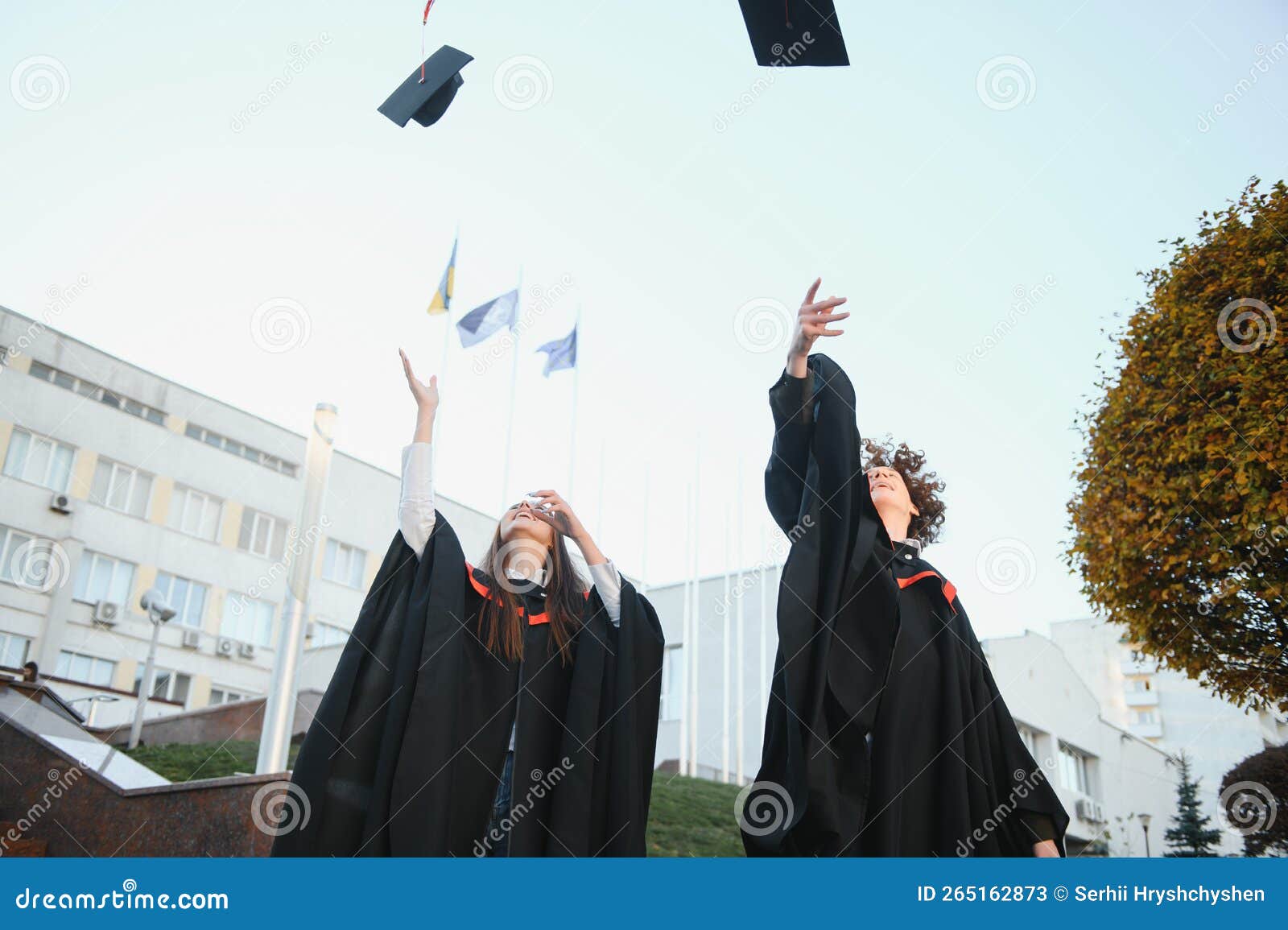 Portrait of Two Happy Graduating Students. Stock Image - Image of ...