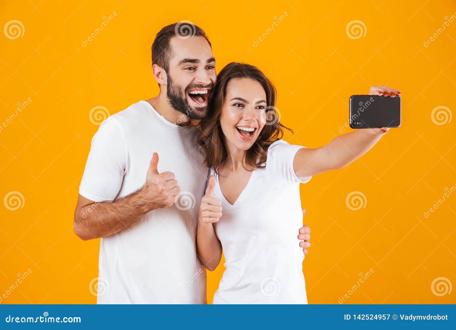 Portrait Of Two Happy People Man And Woman Taking Selfie Photo On