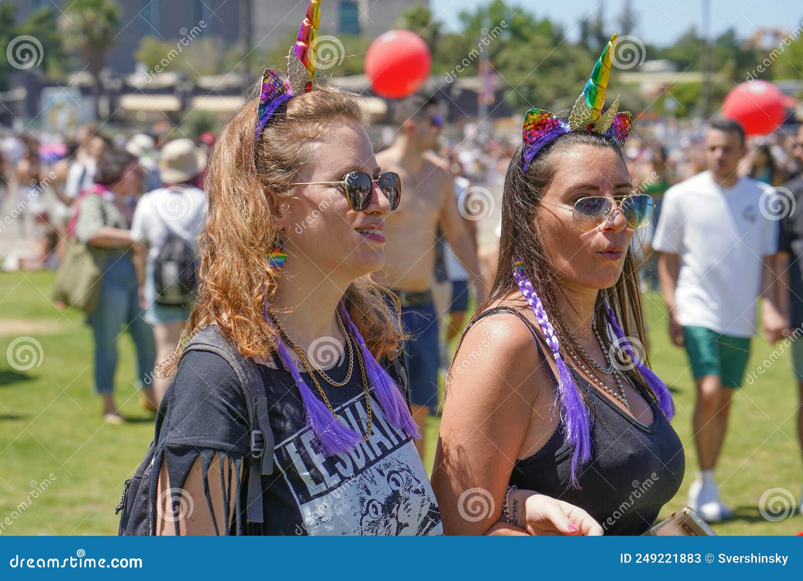 Parade Of Lesbians And Gays Lesbians Walking In The Gay Pride Parade