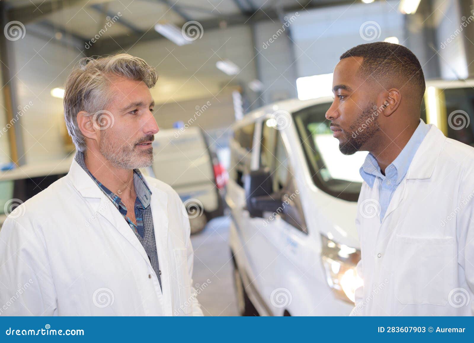 Portrait Two Paramedics Talking Stock Image - Image of unit, white ...