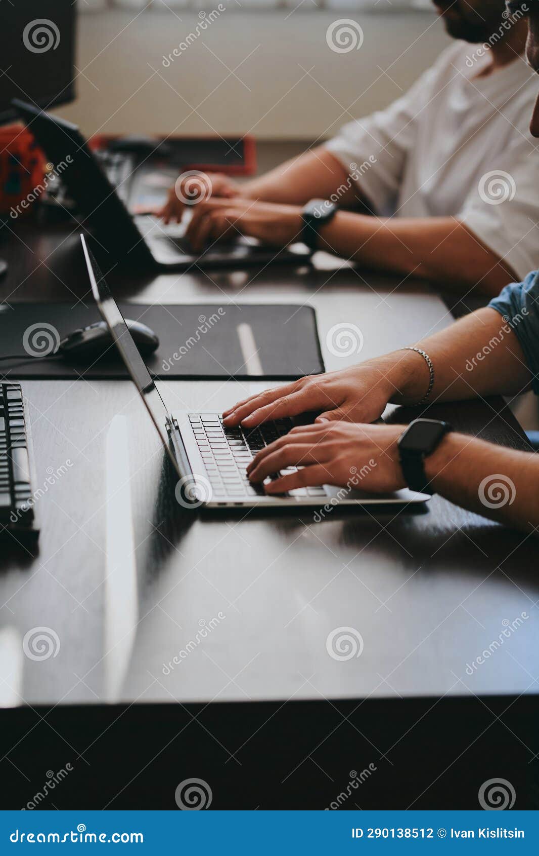 Portrait of Two Professional Male Programmers Working on Computer in ... Portrait of Two Professional Male Programmers Working on Computer in ...