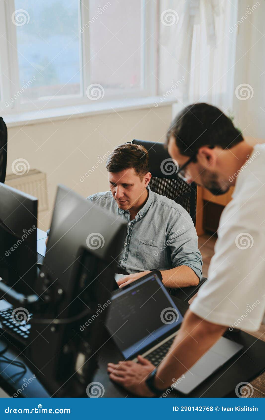 Portrait of Two Professional Male Programmers Working on Computer in ... Portrait of Two Professional Male Programmers Working on Computer in ...