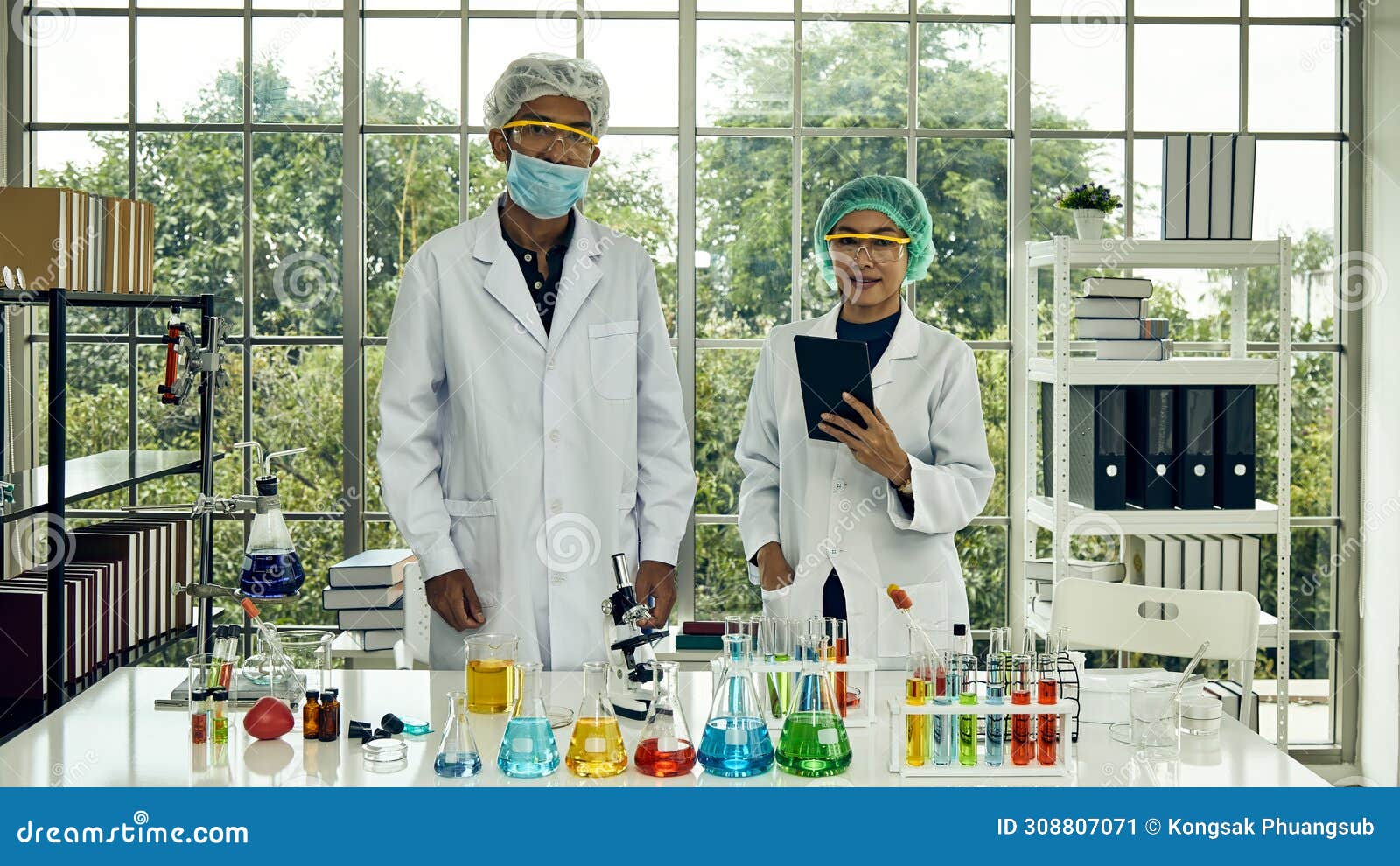 Portrait of Two Scientists Standing with Digital Tablet in Laboratory ...
