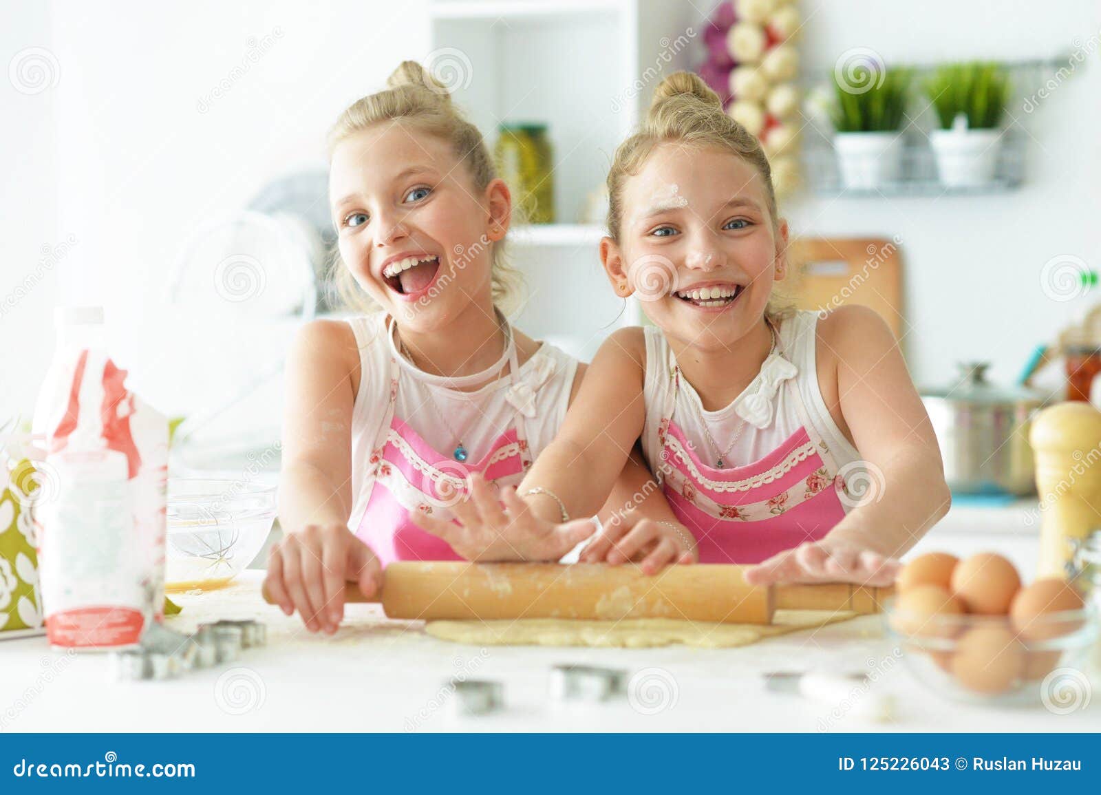 Portrait of a Two Sisters in the Kitchen Stock Image - Image of ...