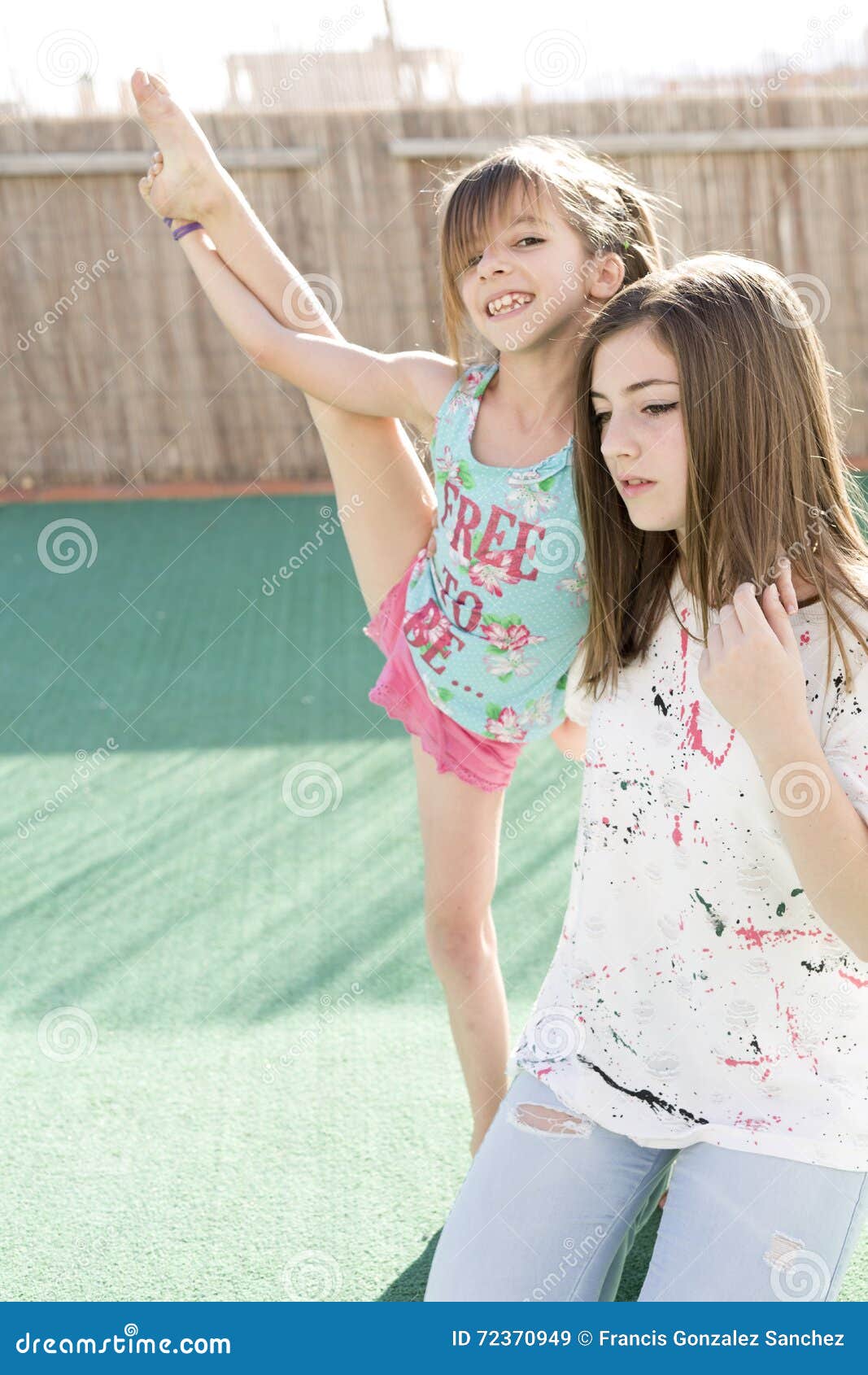 Portrait of two sisters stock image. Image of close, people - 72370949