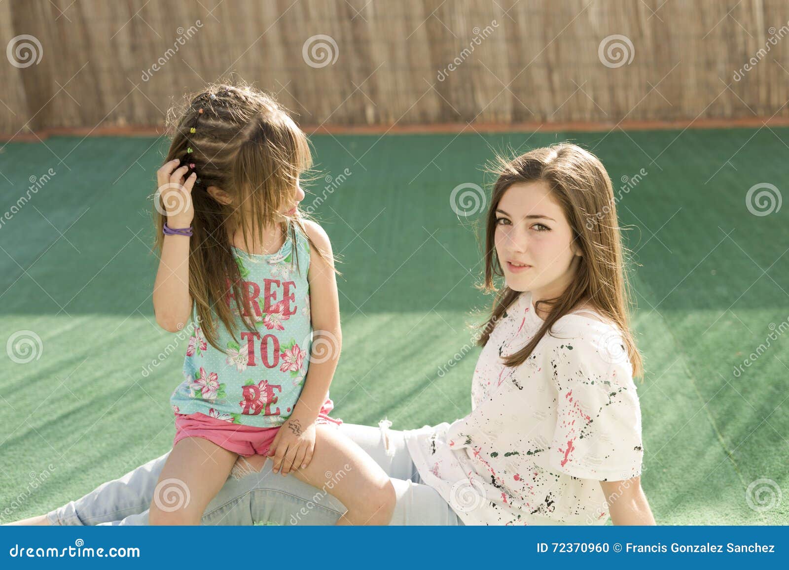 Portrait of two sisters stock photo. Image of light, portrait - 72370960