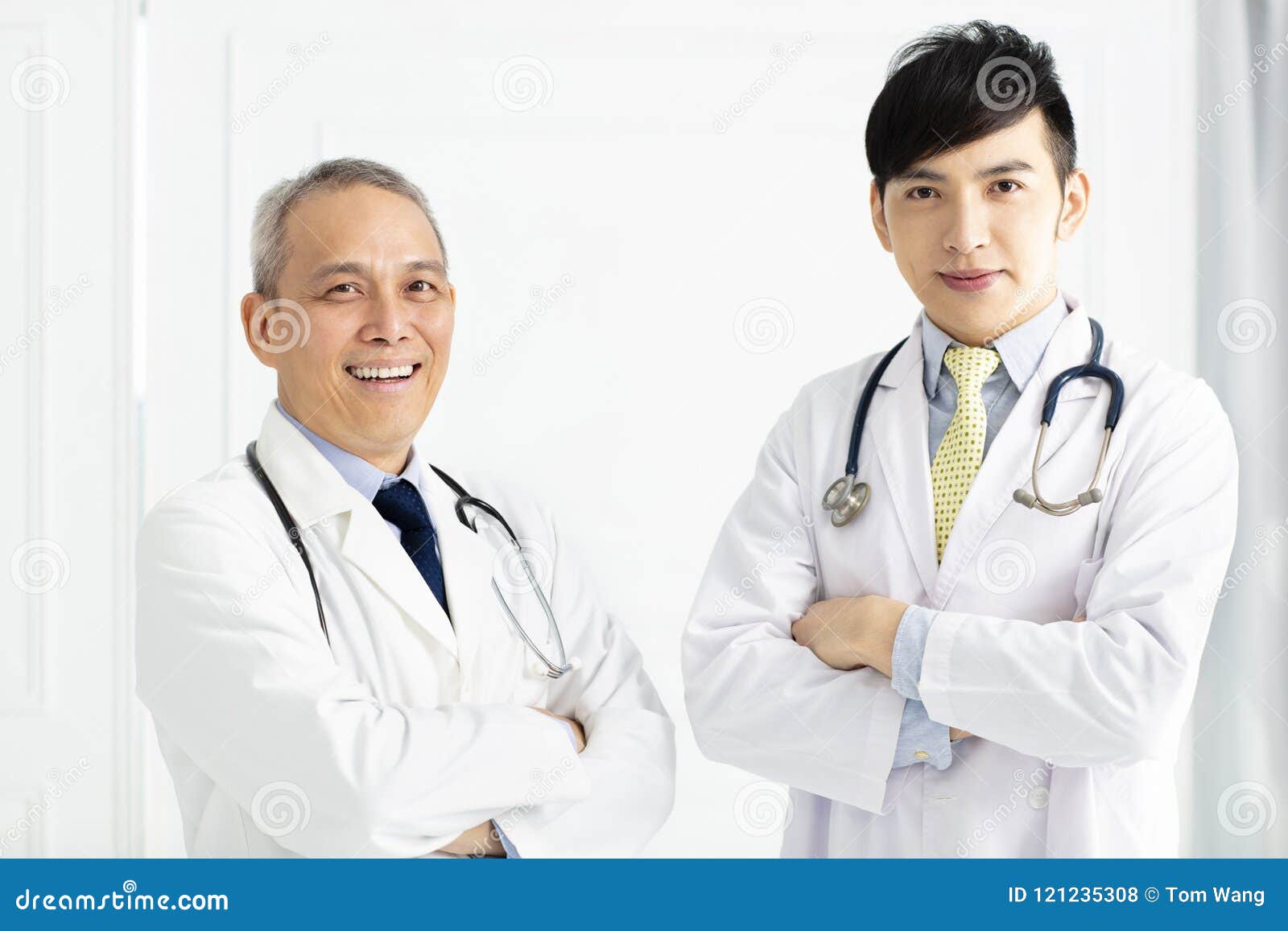 Portrait of Two Smiling Doctors Standing Stock Photo - Image of ...
