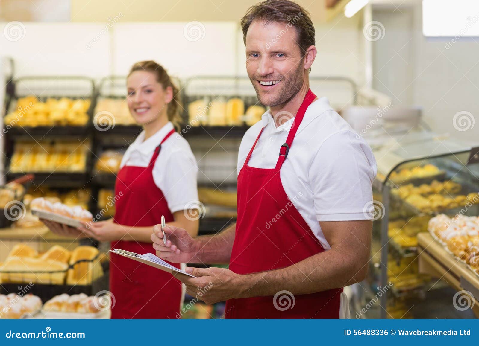 Portrait of a Two Smiling Bakers Looking at Camera Stock Photo - Image ...