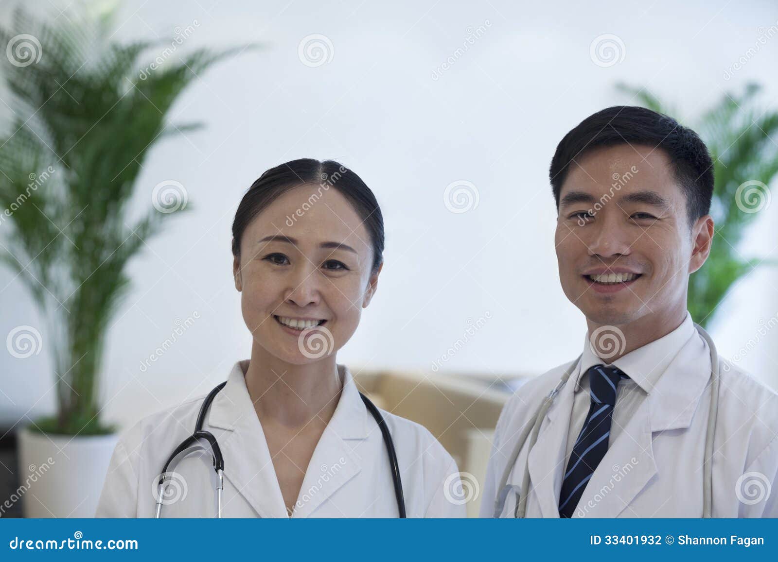 Portrait of Two Smiling Doctors in the Hospital Stock Photo - Image of ...