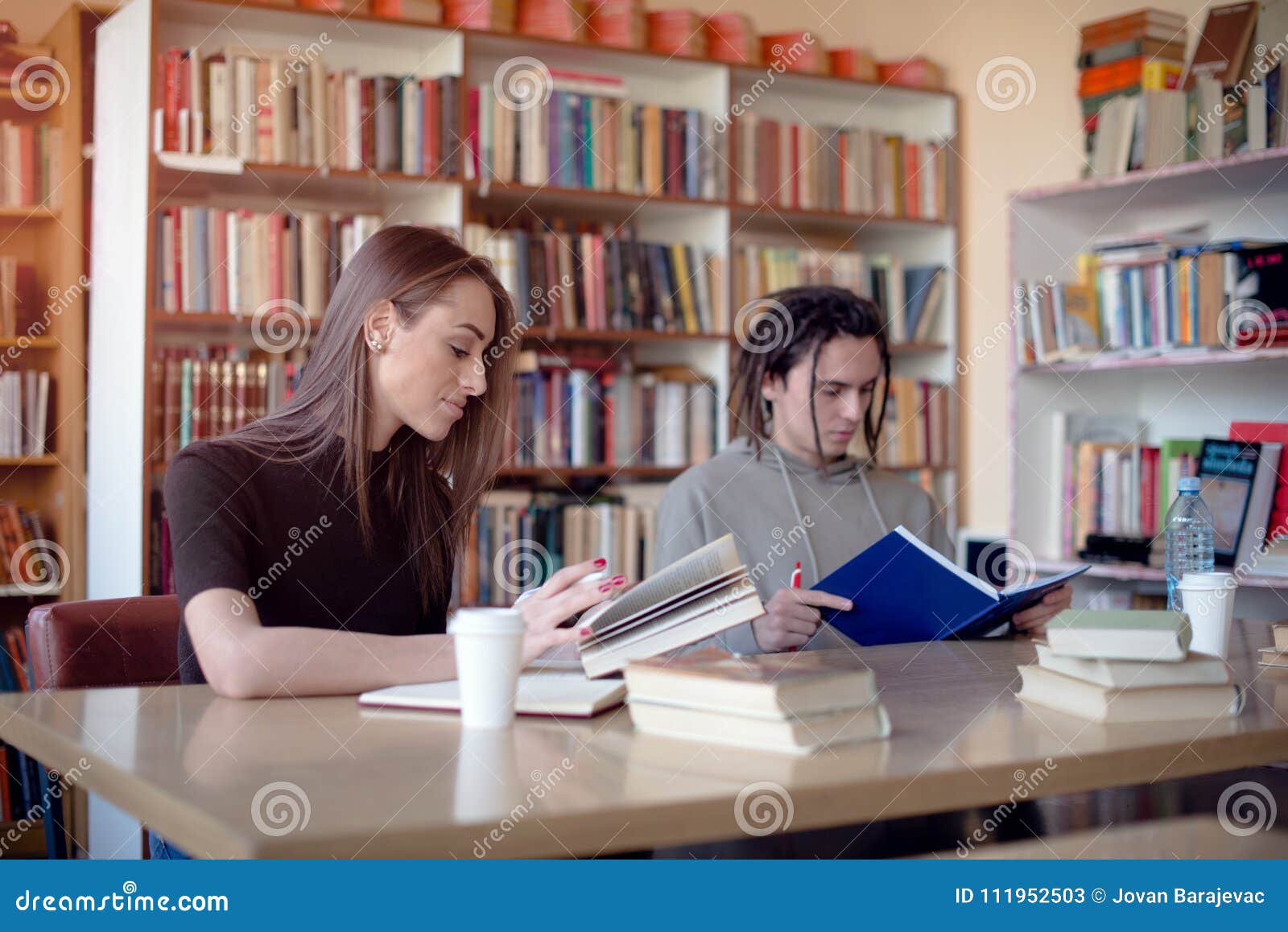 Portrait of Two Students Learning in Library Stock Image - Image of ...