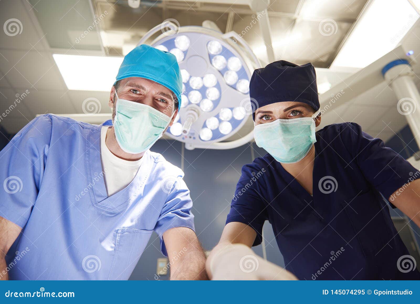 Portrait of Two Surgeons Over the Operating Table Stock Image - Image ...