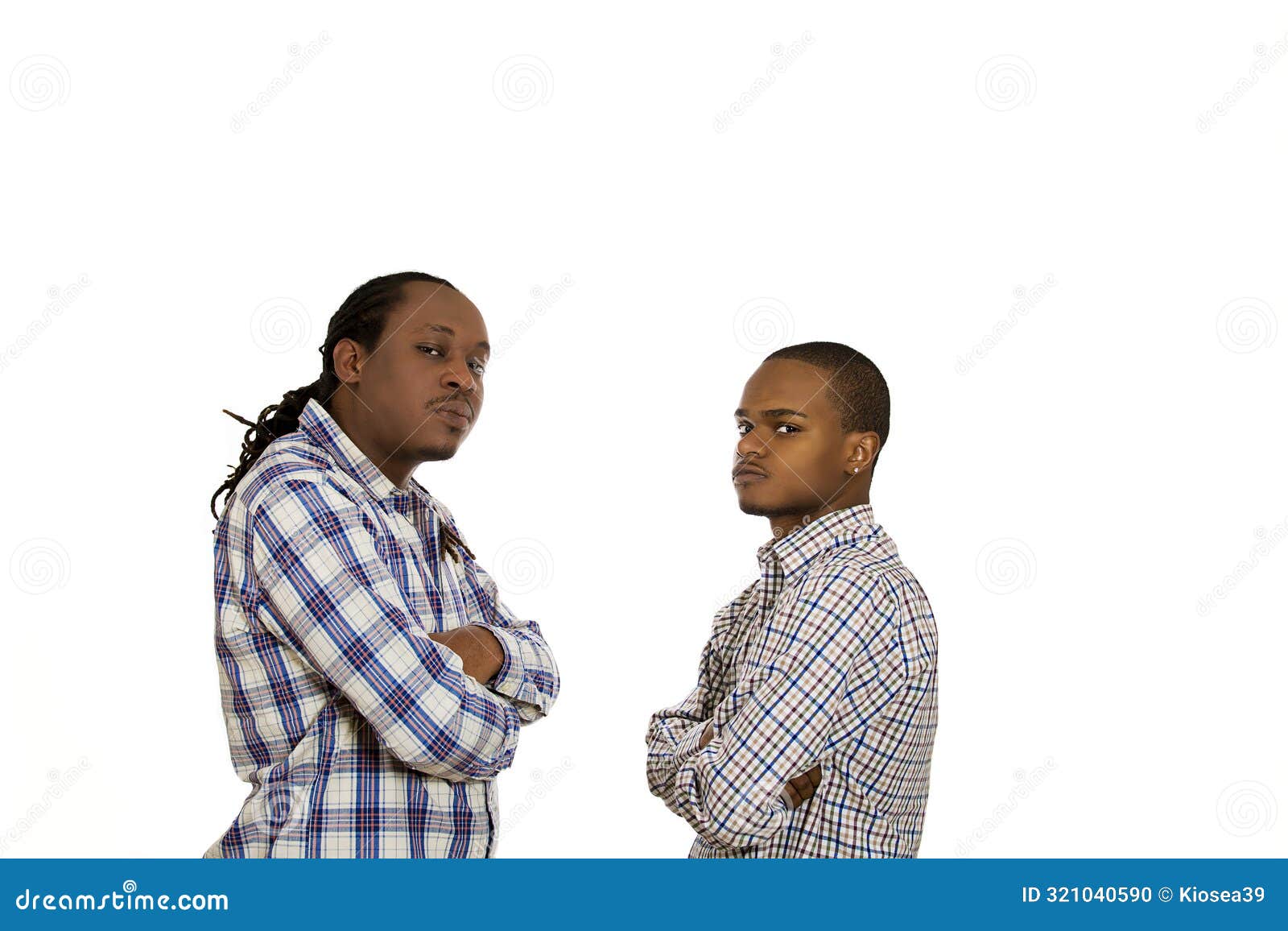 Portrait of Two Suspicious Young Men Looking at Camera Stock Photo ...
