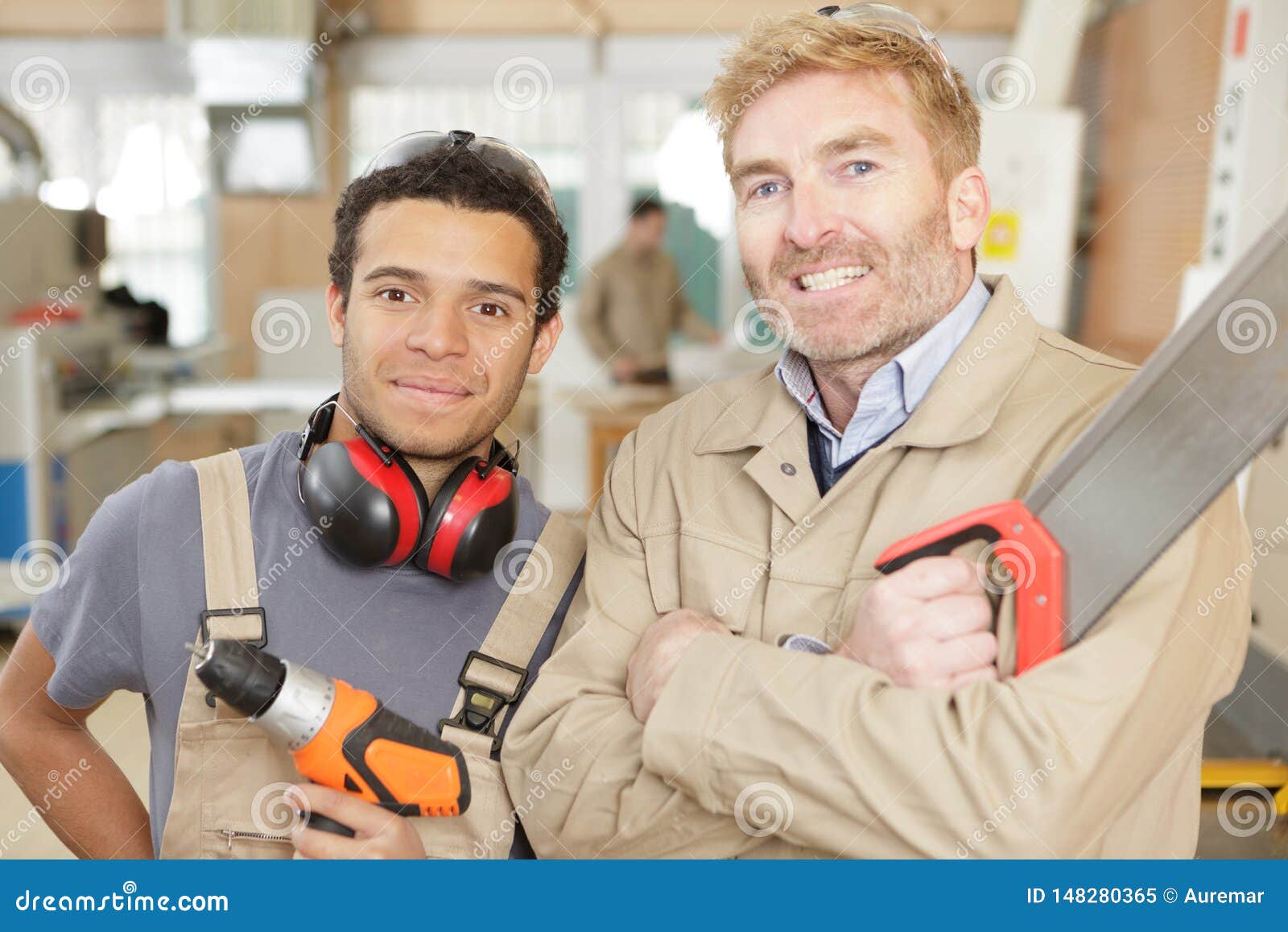 Portrait Two Tradesmen Holding Saw and Drill Stock Image - Image of ...