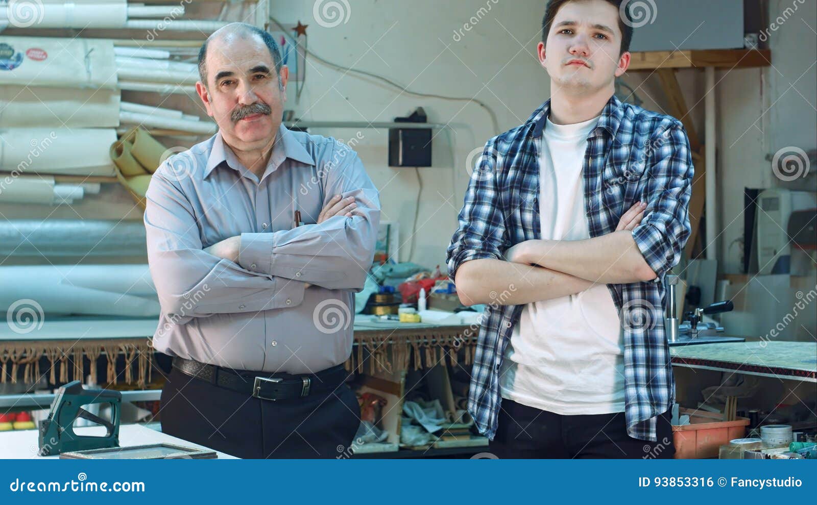 Portrait of Two Workers, Standing in Workshop and Looking at Camera ...