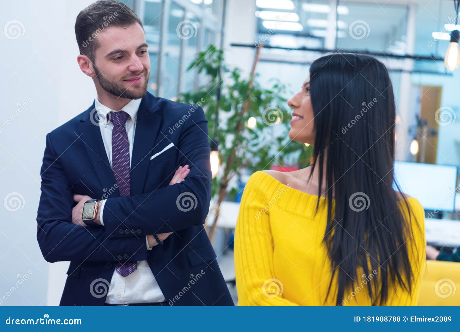 Portrait of Two Young Co Workers Standing at Workplace Inside Modern Co ...