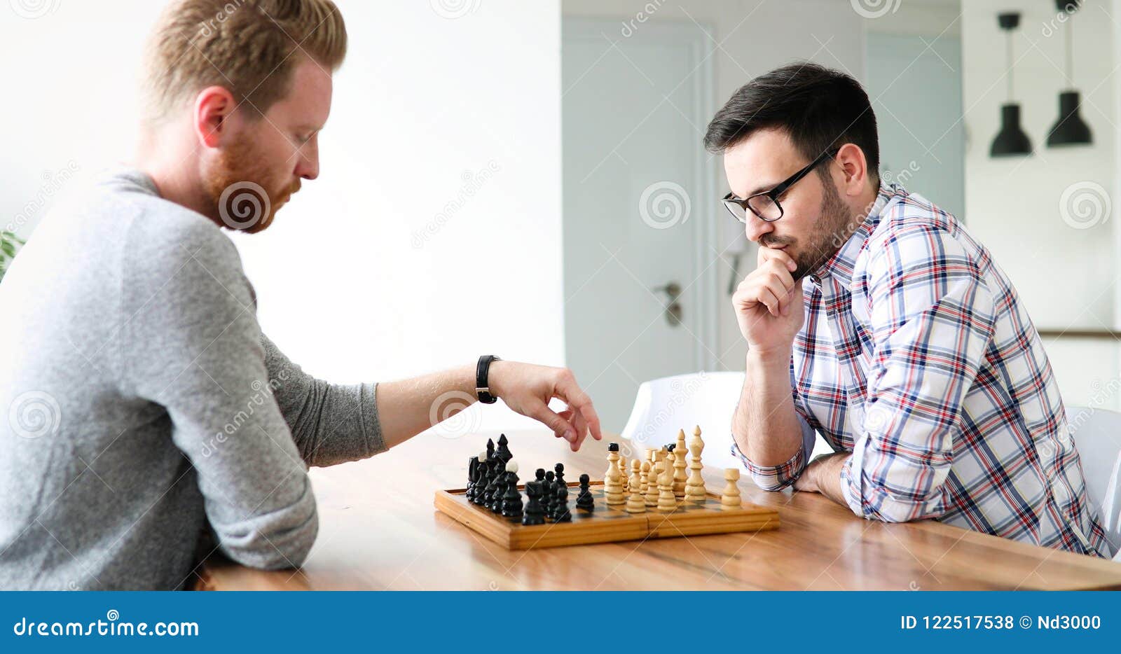 Two Young Man Playing Chess Stock Photo - Image of king, background ...
