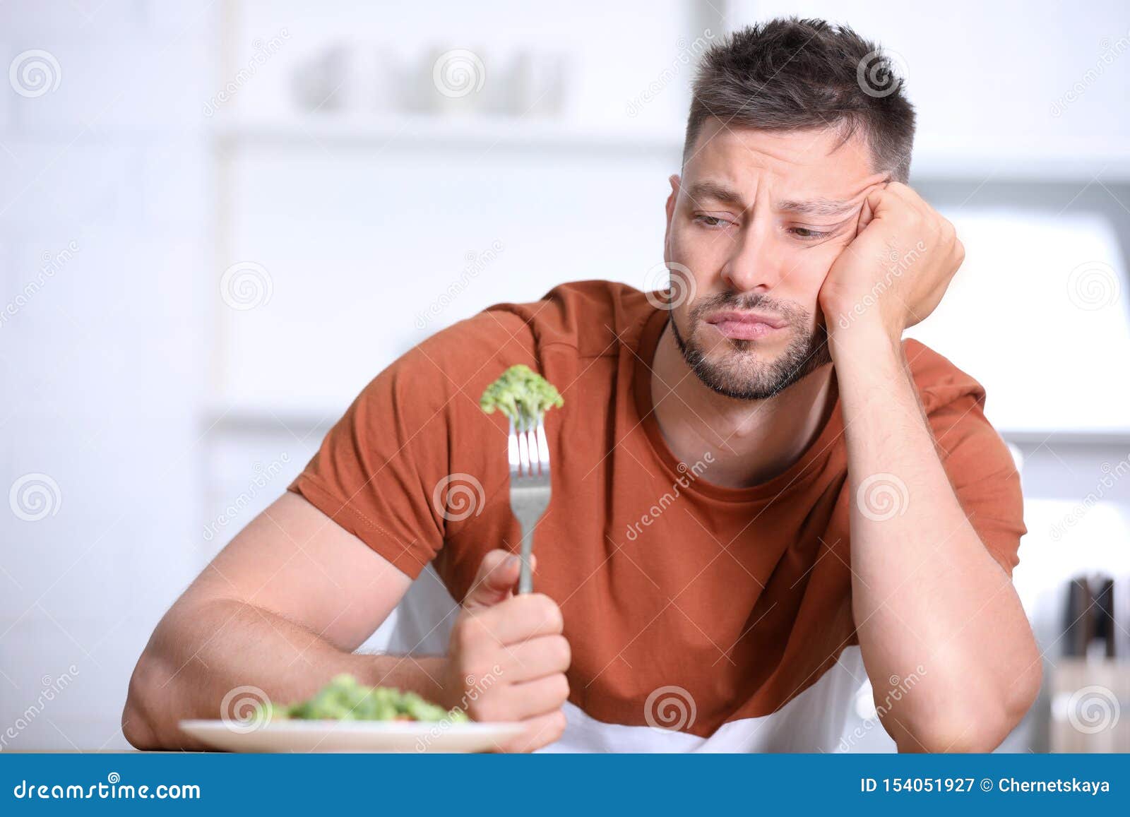 Portrait of Unhappy Man Eating Broccoli Salad Stock Image - Image of ...
