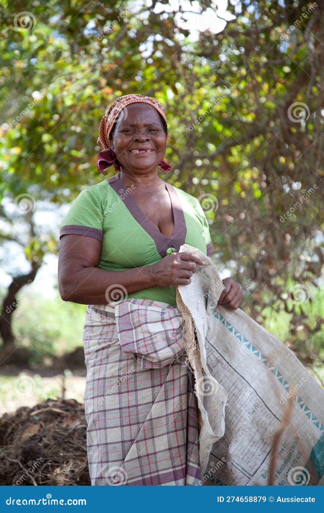 Portrait of Unidentified Woman with Missing Teeth Smiling at the Camera ...