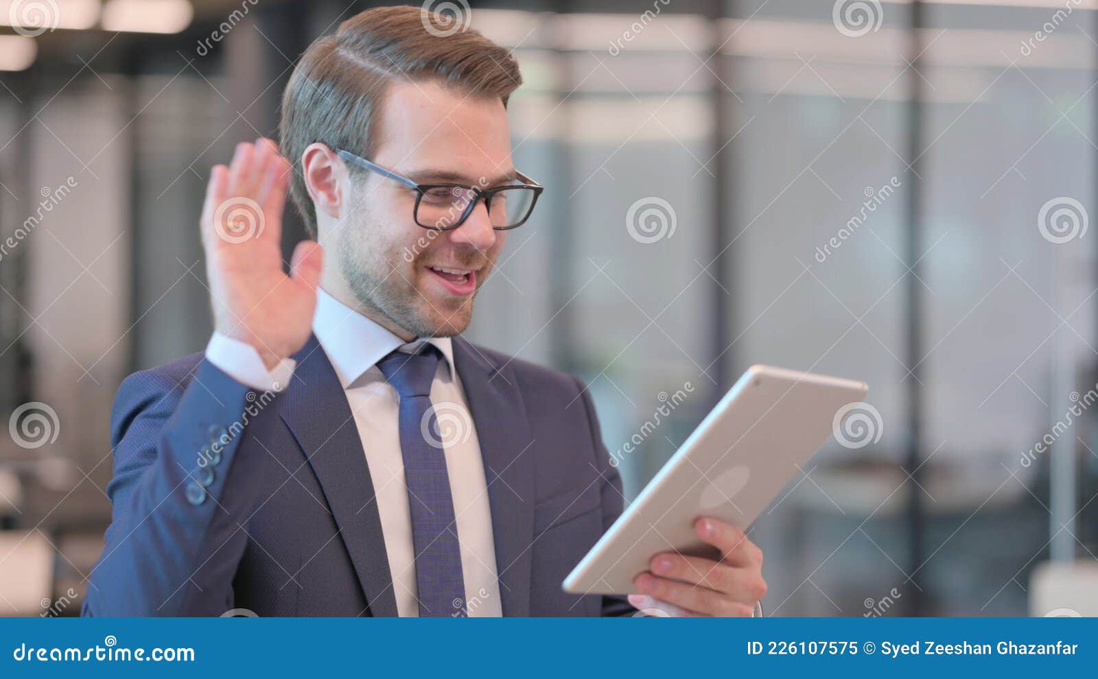 Portrait of Video Call on Tablet by Young Businessman Stock Image ...
