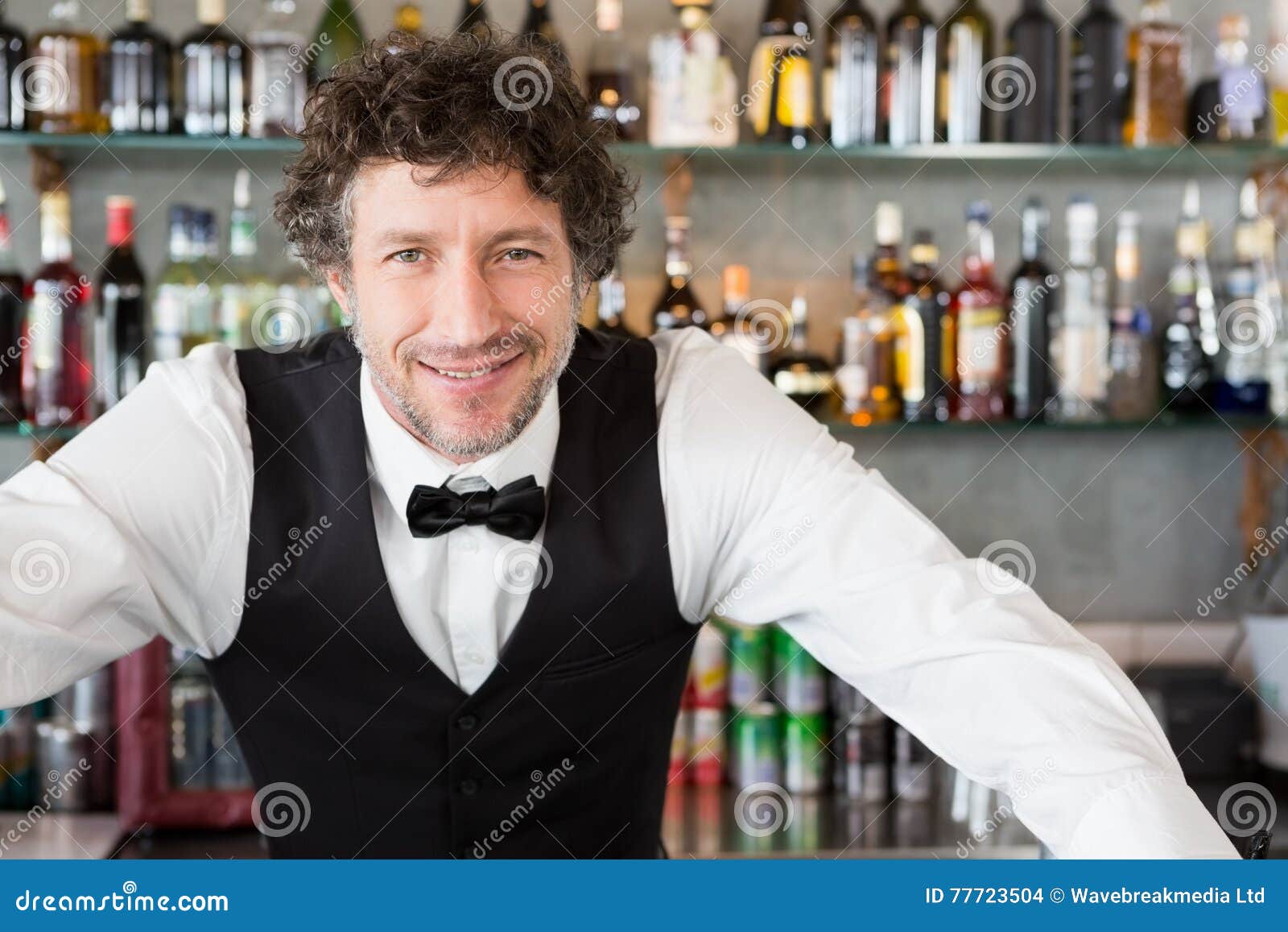 Portrait of waiter smiling stock photo. Image of happy - 77723504