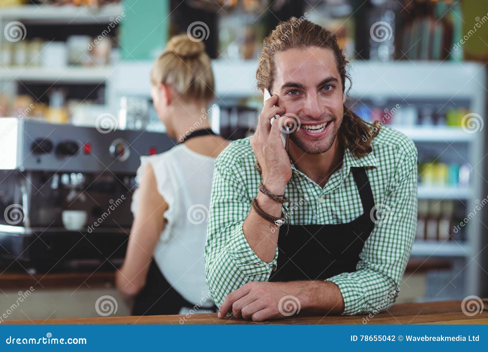 Portrait of Waiter Talking on Mobile Phone Stock Photo - Image of ...