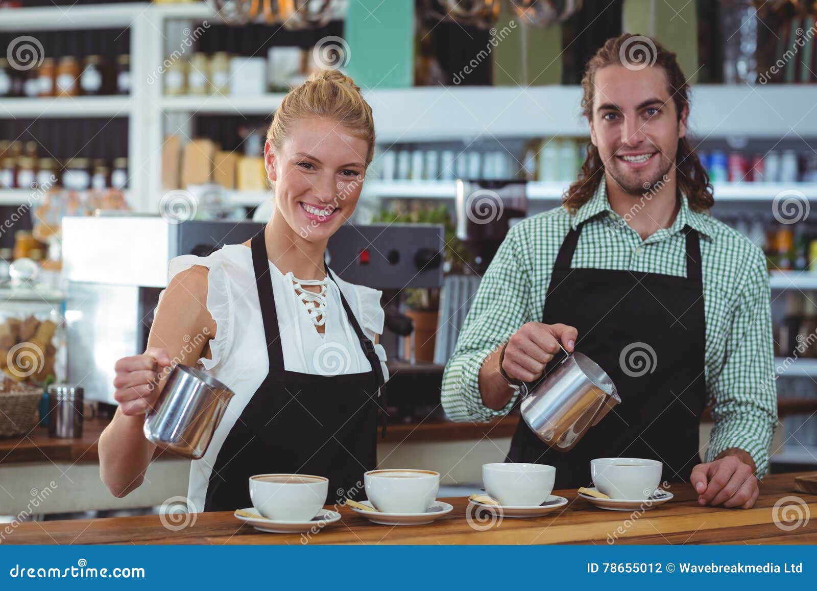 Portrait of Waiter and Waitress Making Cup of Coffee at Counter Stock ...