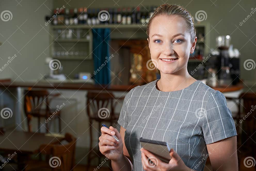 Portrait of Waitress with Notepad in Restaurant Stock Photo - Image of ...