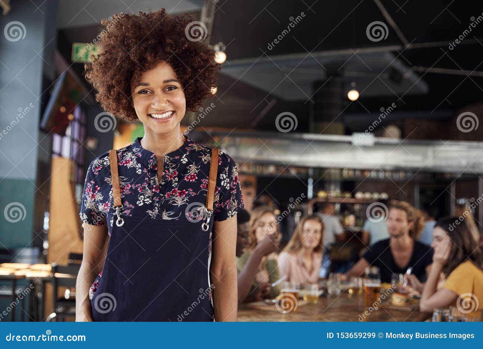 Portrait of Waitress Serving in Busy Bar Restaurant Stock Image - Image ...