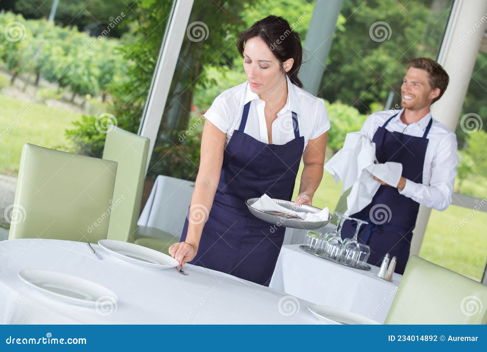 Portrait Waitress Setting Table Stock Photo - Image of steel, vineyard ...