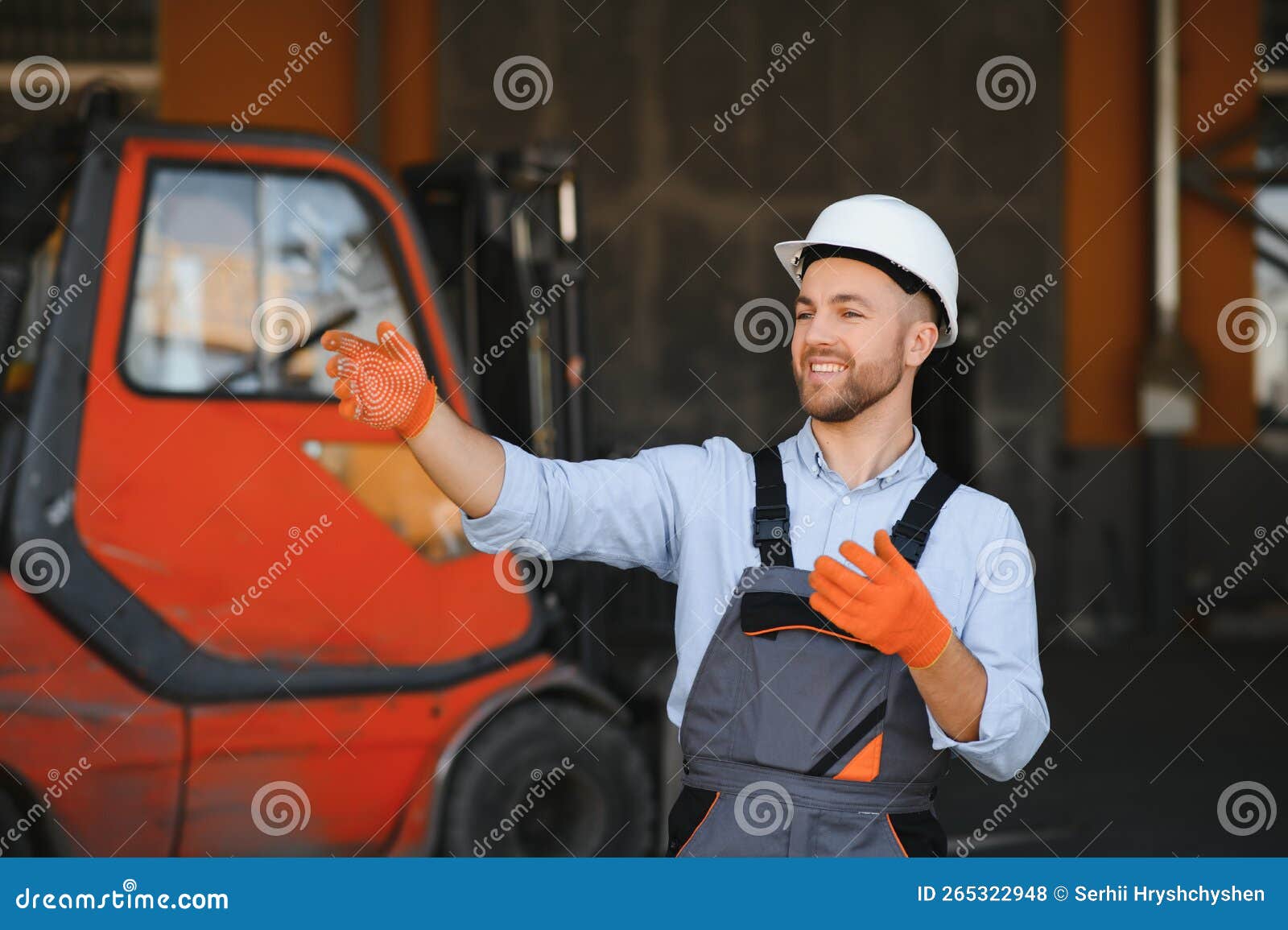 Portrait of Warehouse Forklift Driver Standing in Storehouse by the ...