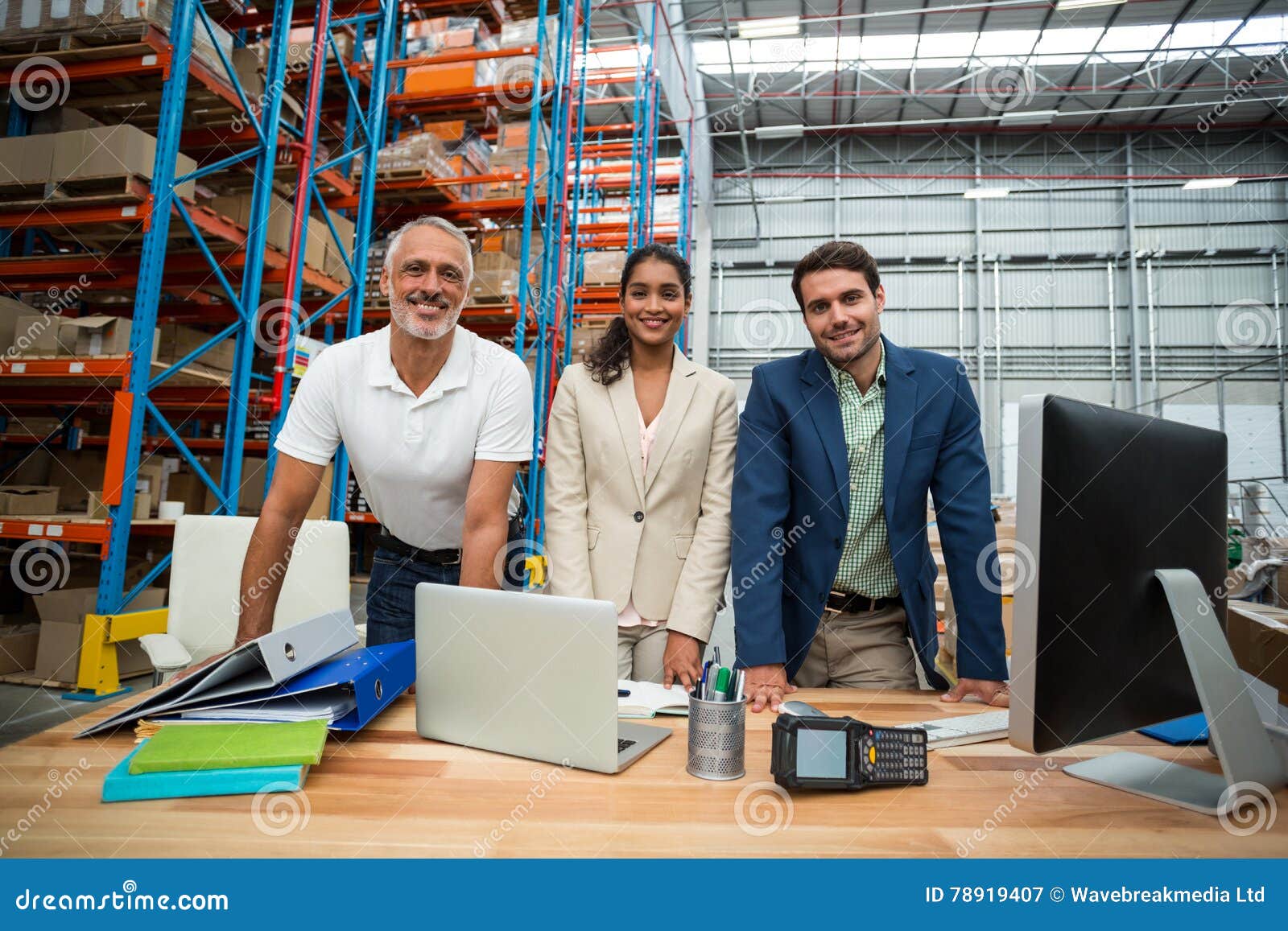 Portrait of Warehouse Managers and Worker Working Together Stock Image ...