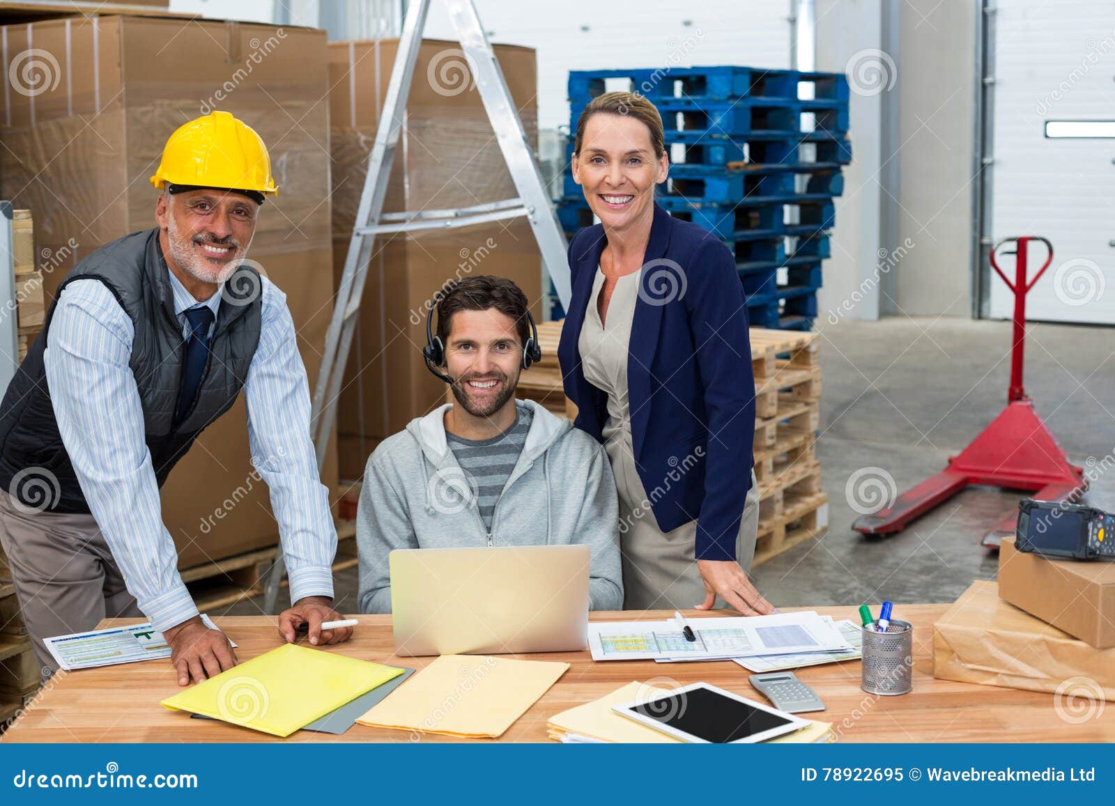 Portrait of Warehouse Managers and Worker Working Together Stock Image ...