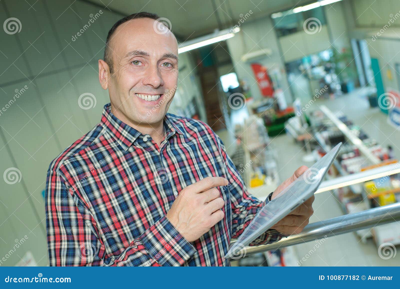 Portrait warehouse worker stock photo. Image of plaid - 100877182