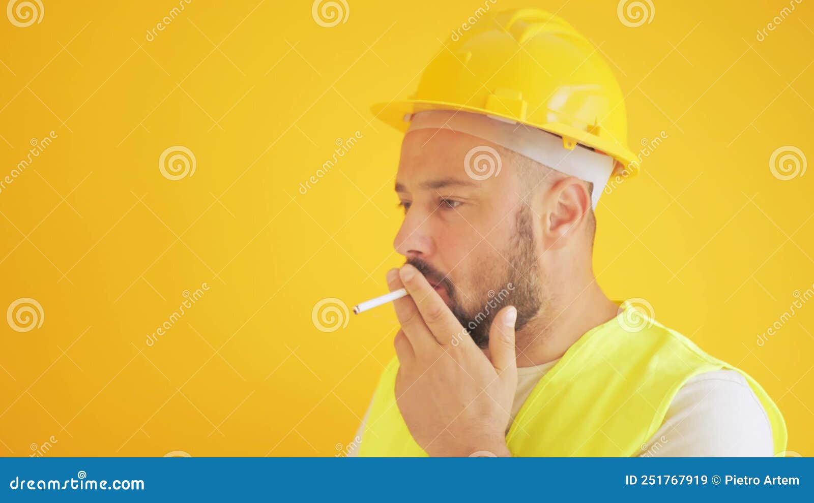 Portrait of a Warehouse Worker or Construction Worker Smoking a ...
