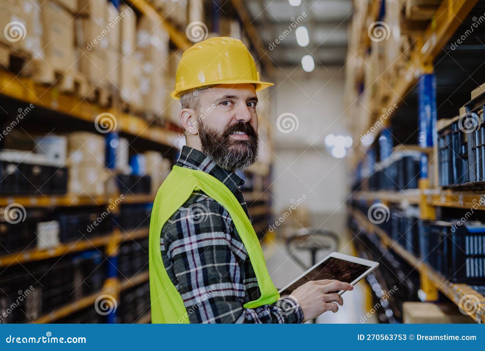 Portrait of a Warehouse Worker or Supervisor with Digital Tablet. Stock ...