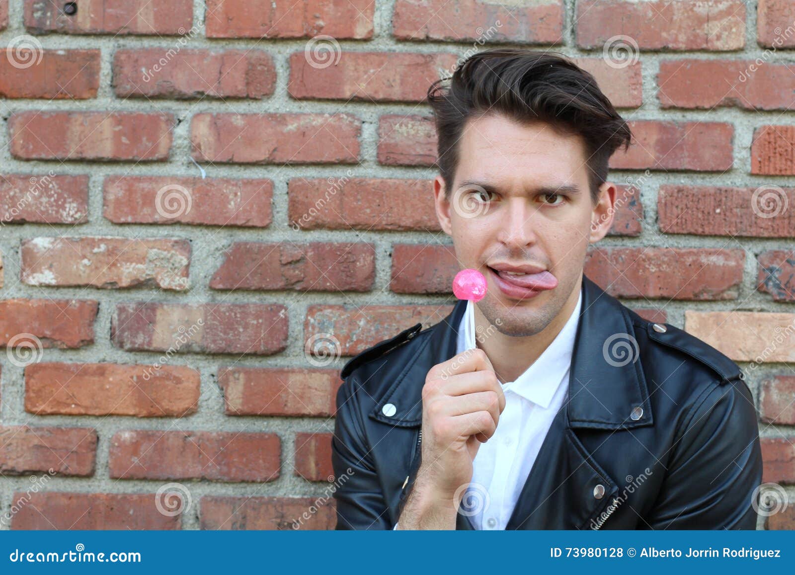 Portrait of Weirdo Man, Isolated on Brick Wall Background Stock Photo ...