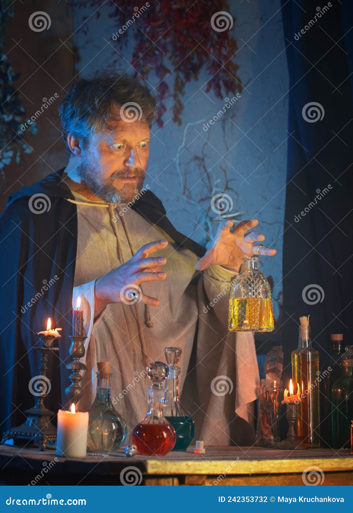 Portrait of Wizard with Candles and Magic Potions Stock Photo - Image ...