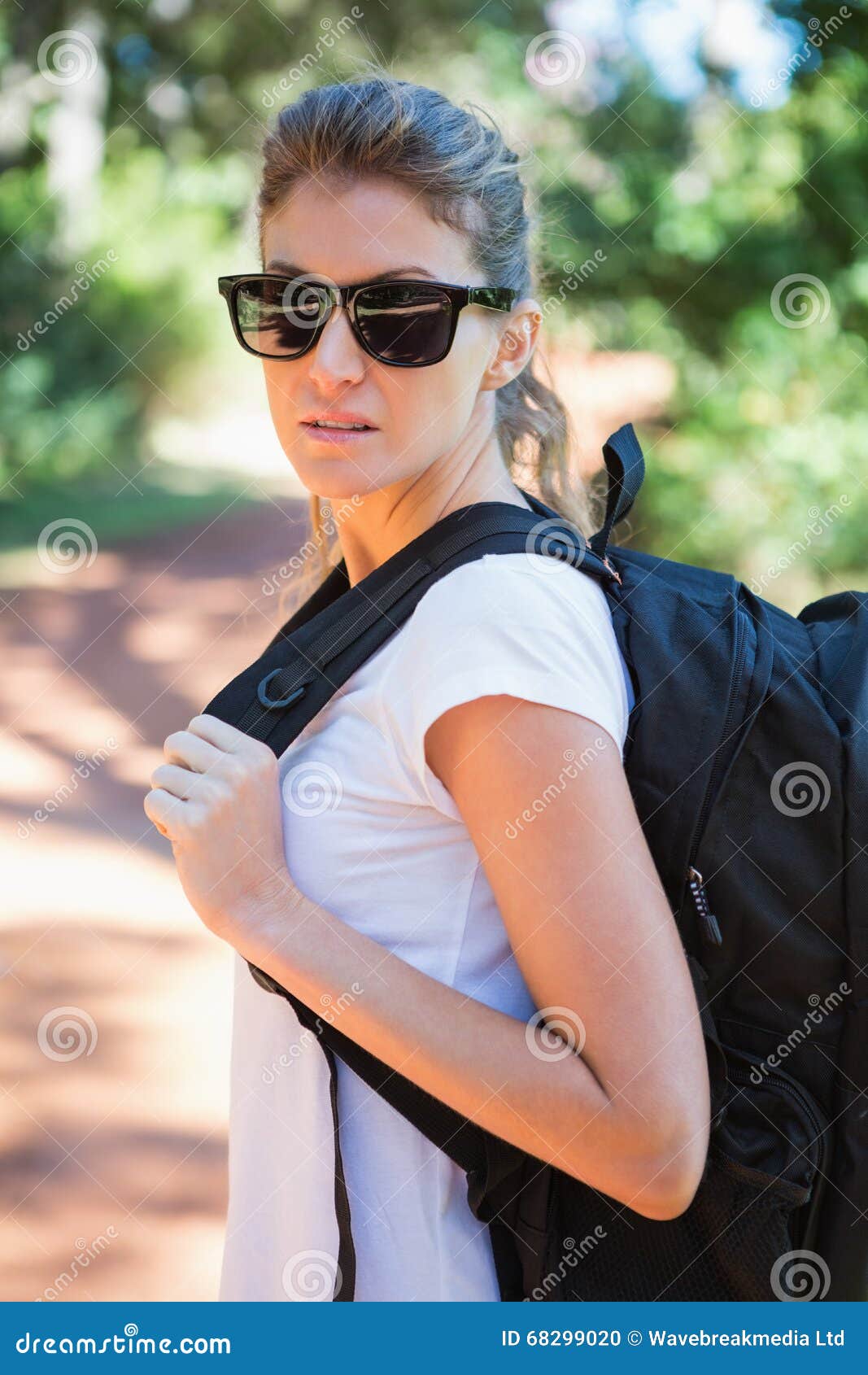 Portrait of Woman with Backpack Stock Photo - Image of adult, greenery ...