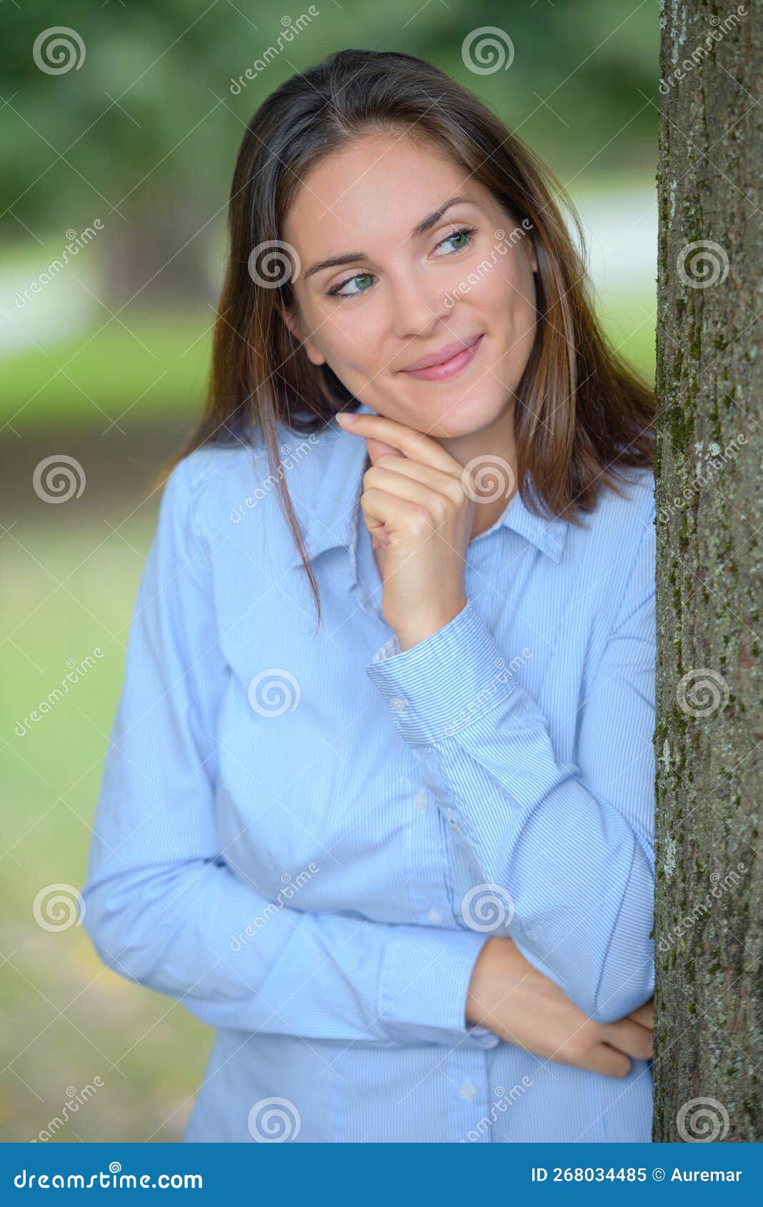 Portrait woman behind tree stock image. Image of smile - 268034485