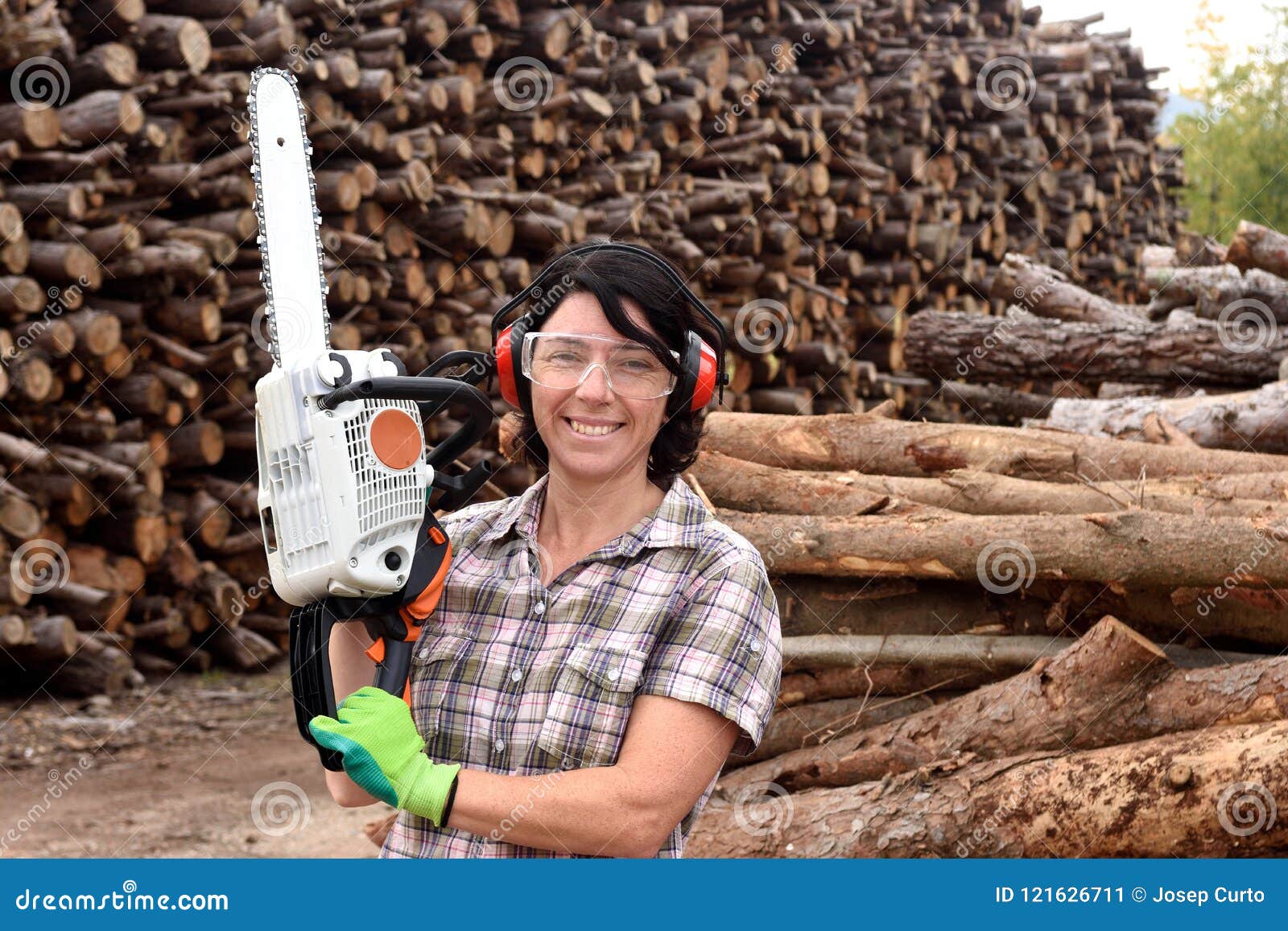 Portrait of a Woman with a Chainsaw Stock Image - Image of smiling ...