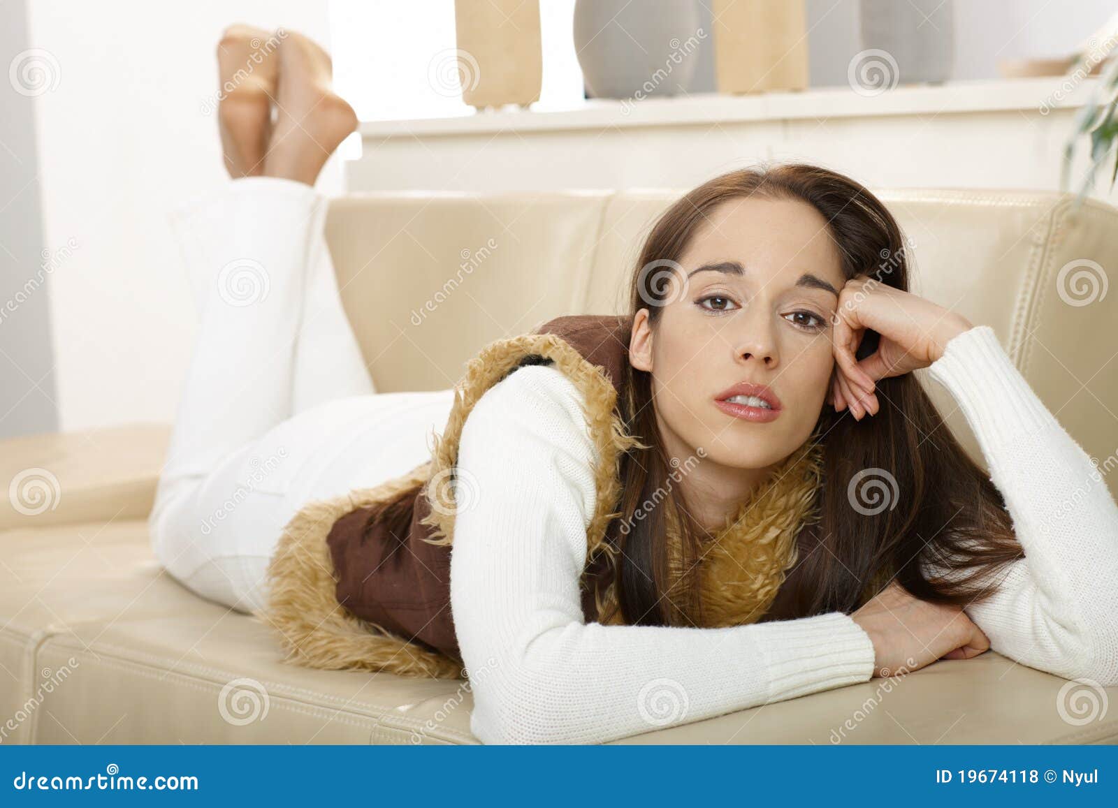 Portrait of woman on couch stock photo. Image of american - 19674118