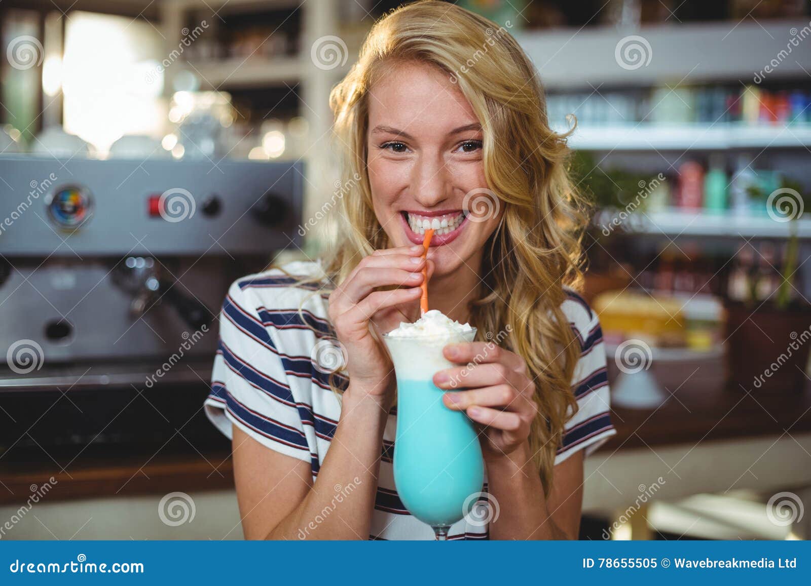 Portrait of Woman Drinking Milkshake with a Straw Stock Image - Image ...