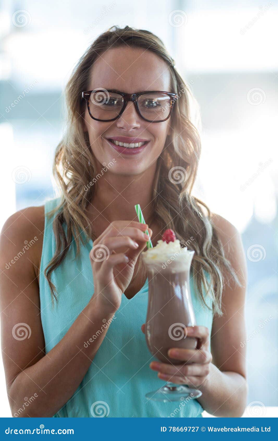 Portrait of Woman Drinking Milkshake with a Straw Stock Image - Image ...