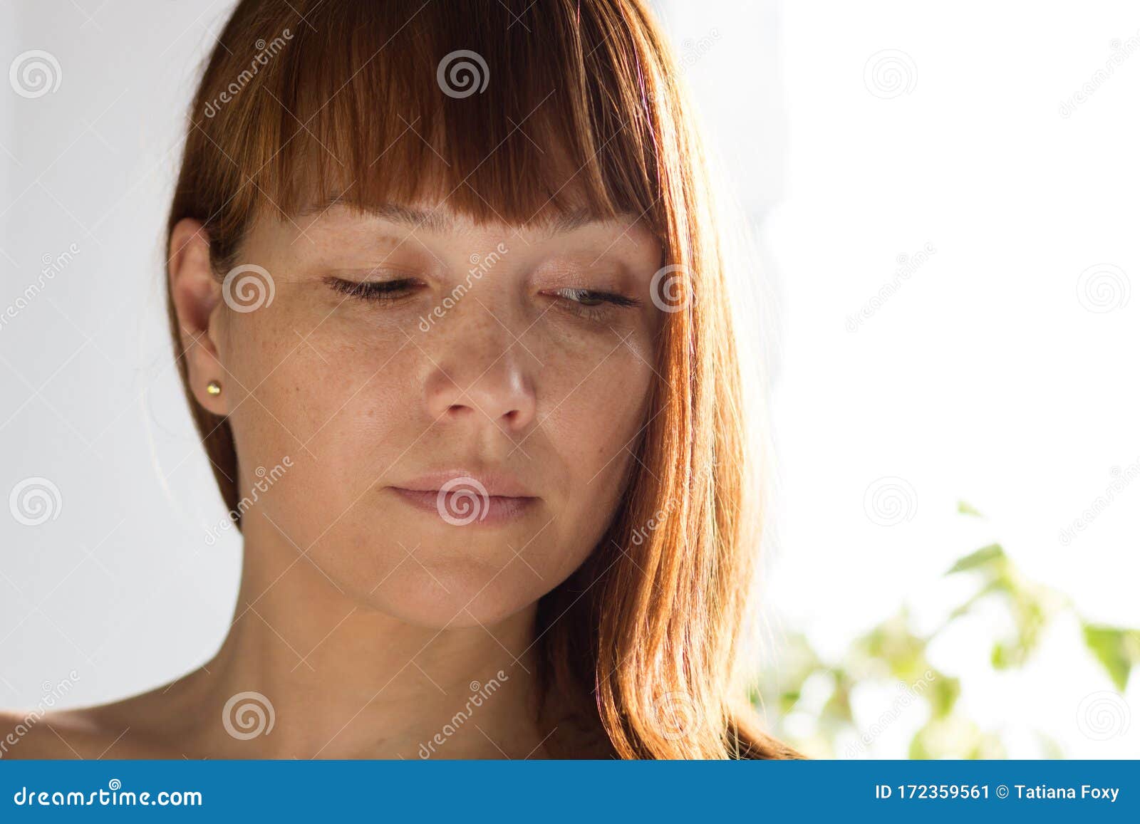 Portrait of Woman Looking Down with Soft Look and Face Stock Image ...