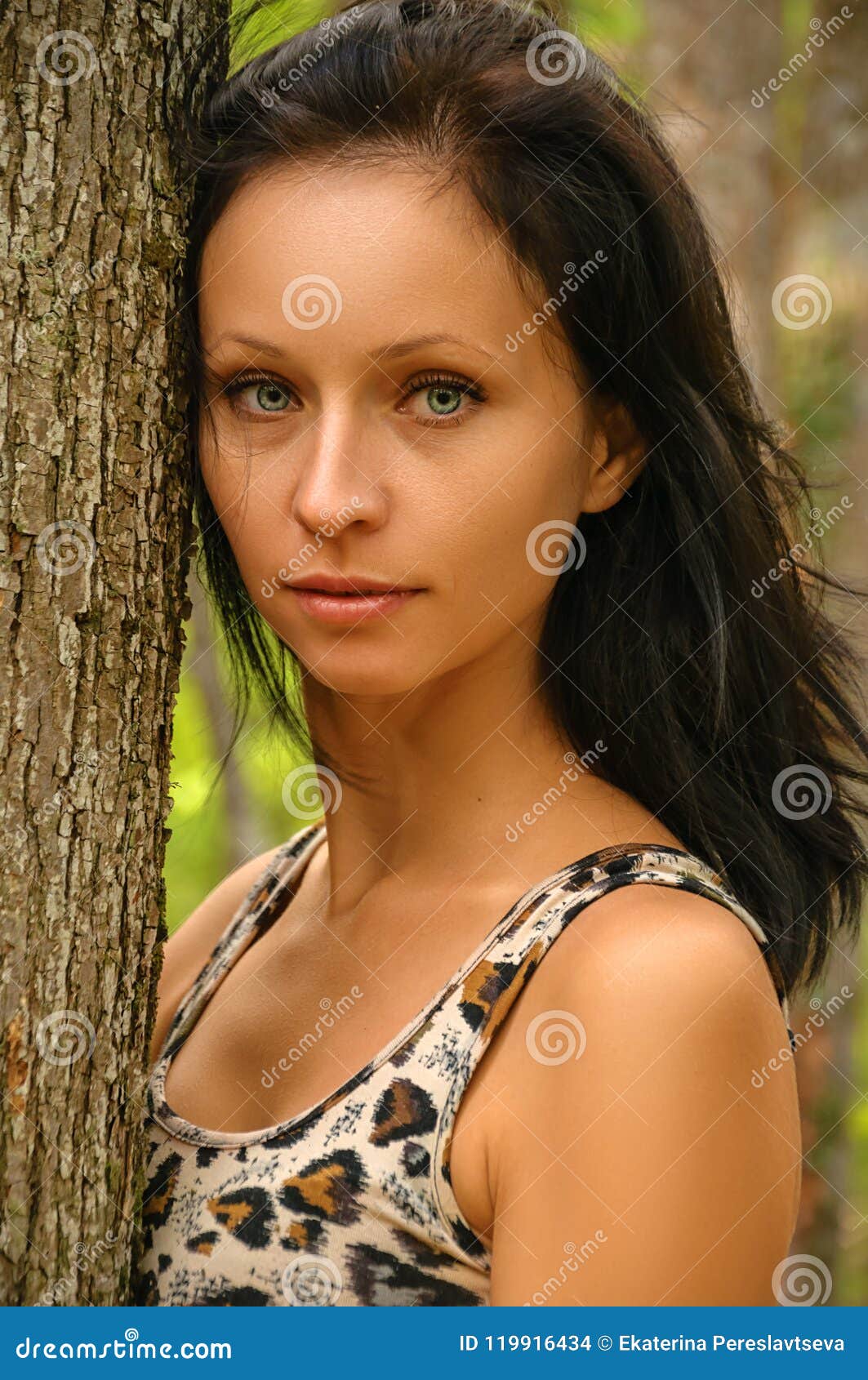 Portrait of a Woman Near a Tree Stock Photo - Image of beautiful ...