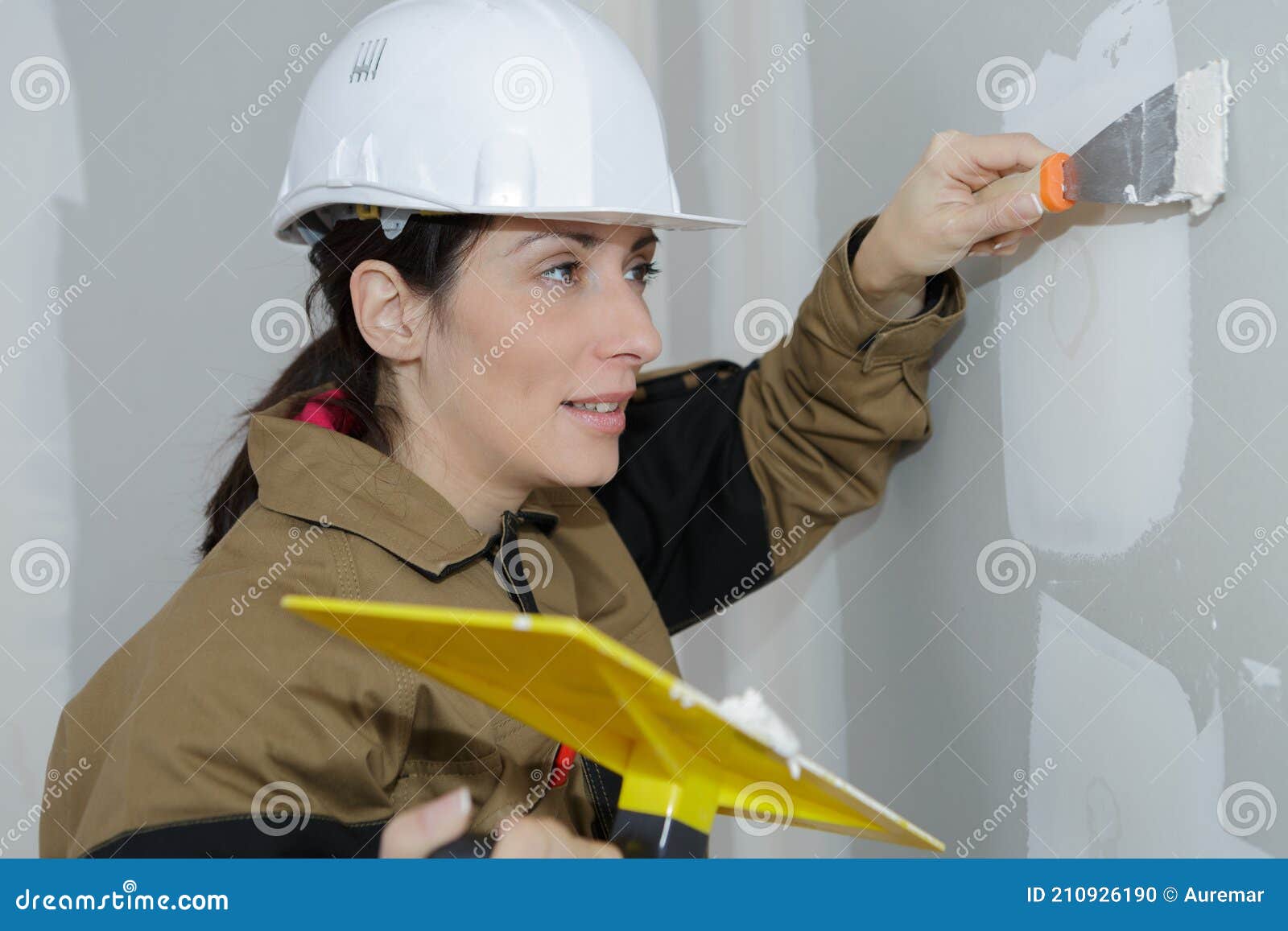 Portrait Woman Plastering Wall Stock Photo - Image of industrial, craft ...